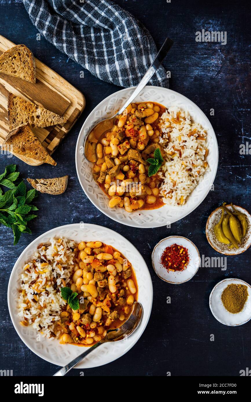 Turkish white bean stew with lamb called kuru fasulye served with orzo ...
