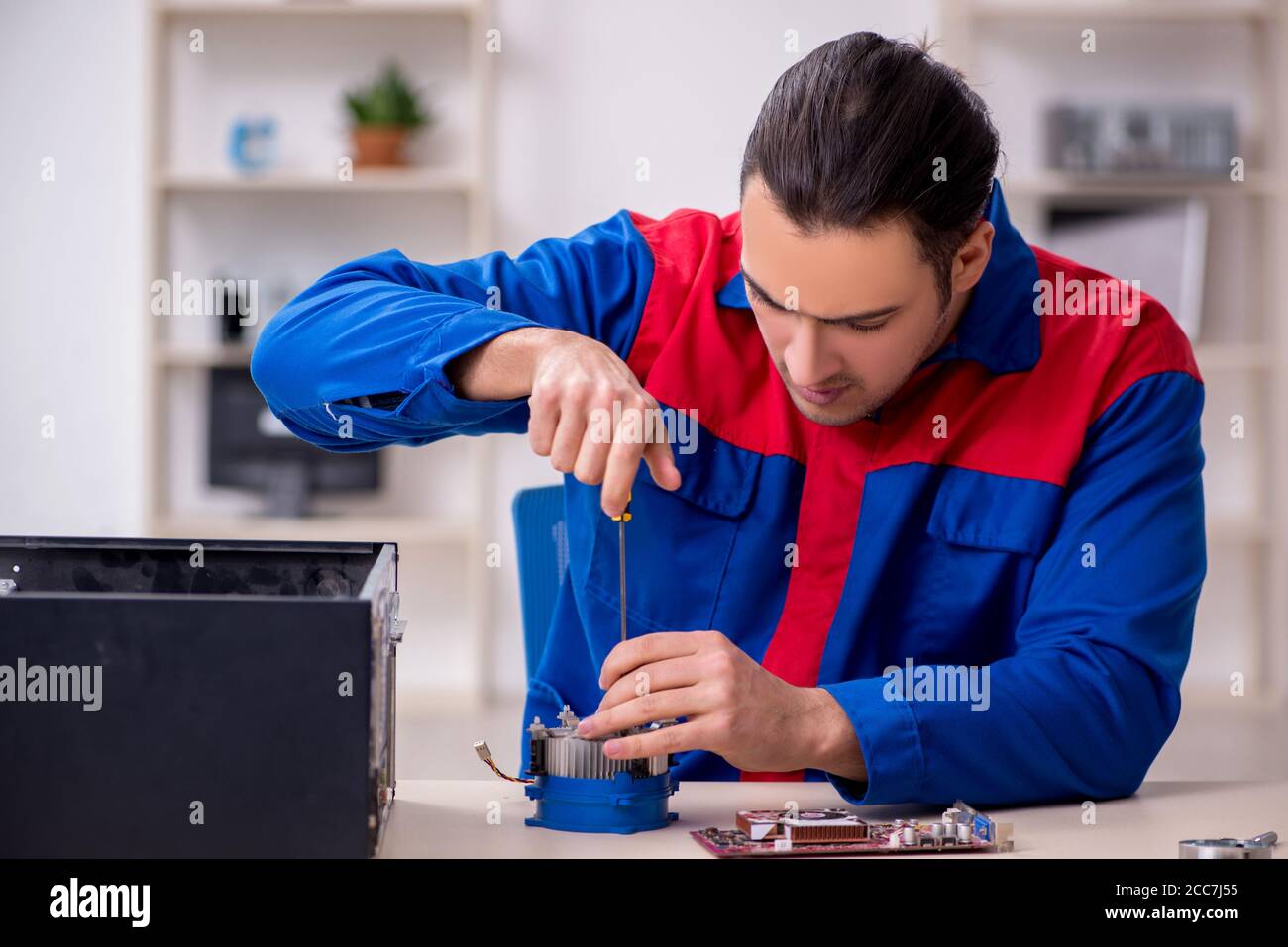 Man repairing device cooling hi-res stock photography and images - Alamy