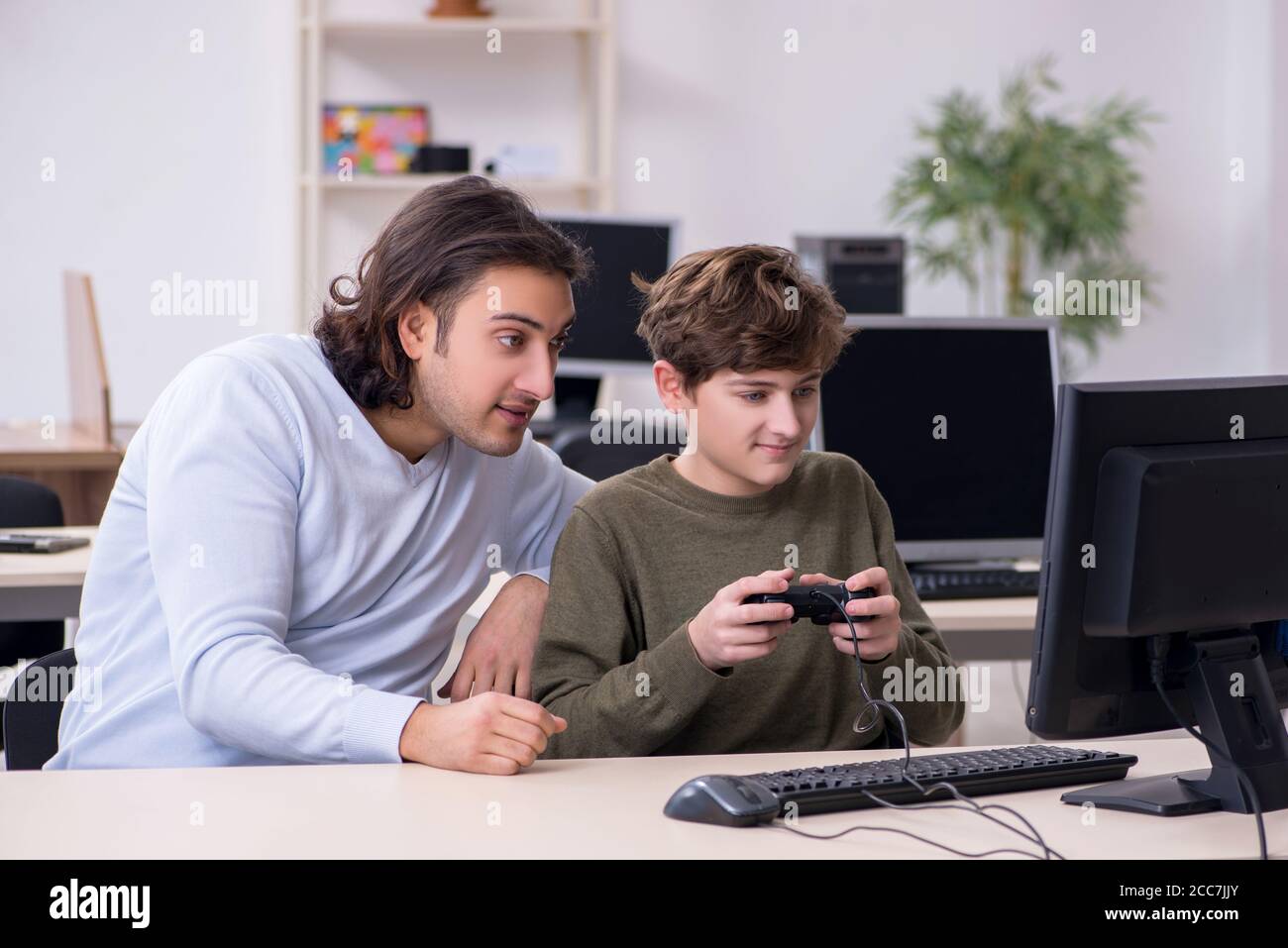 Game addiction father son playing video games hi-res stock photography ...