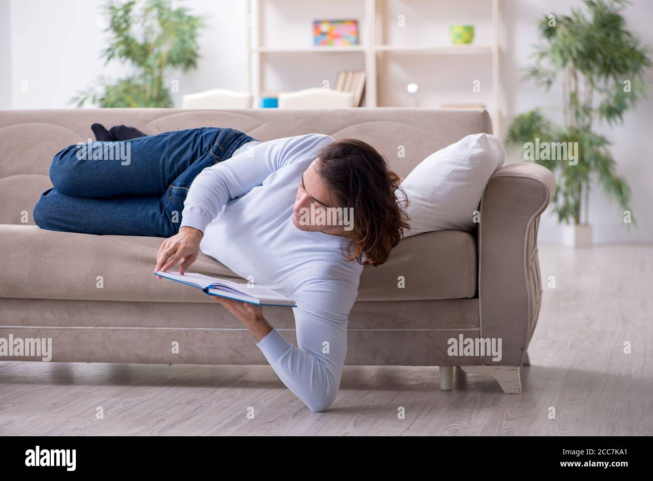 Young student preparing for exams at home Stock Photo - Alamy