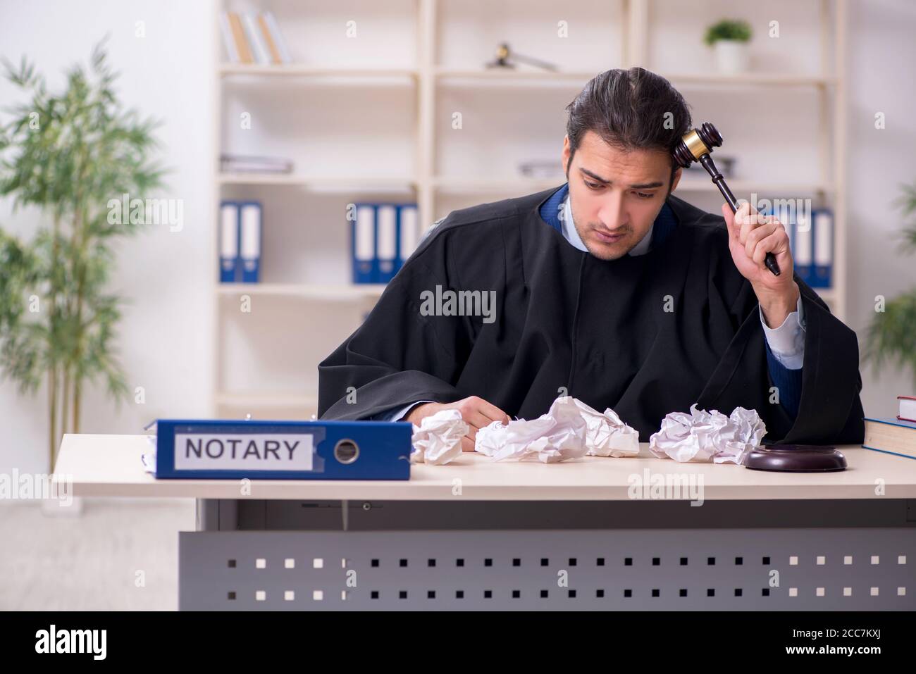 Young judge working in courthouse Stock Photo - Alamy