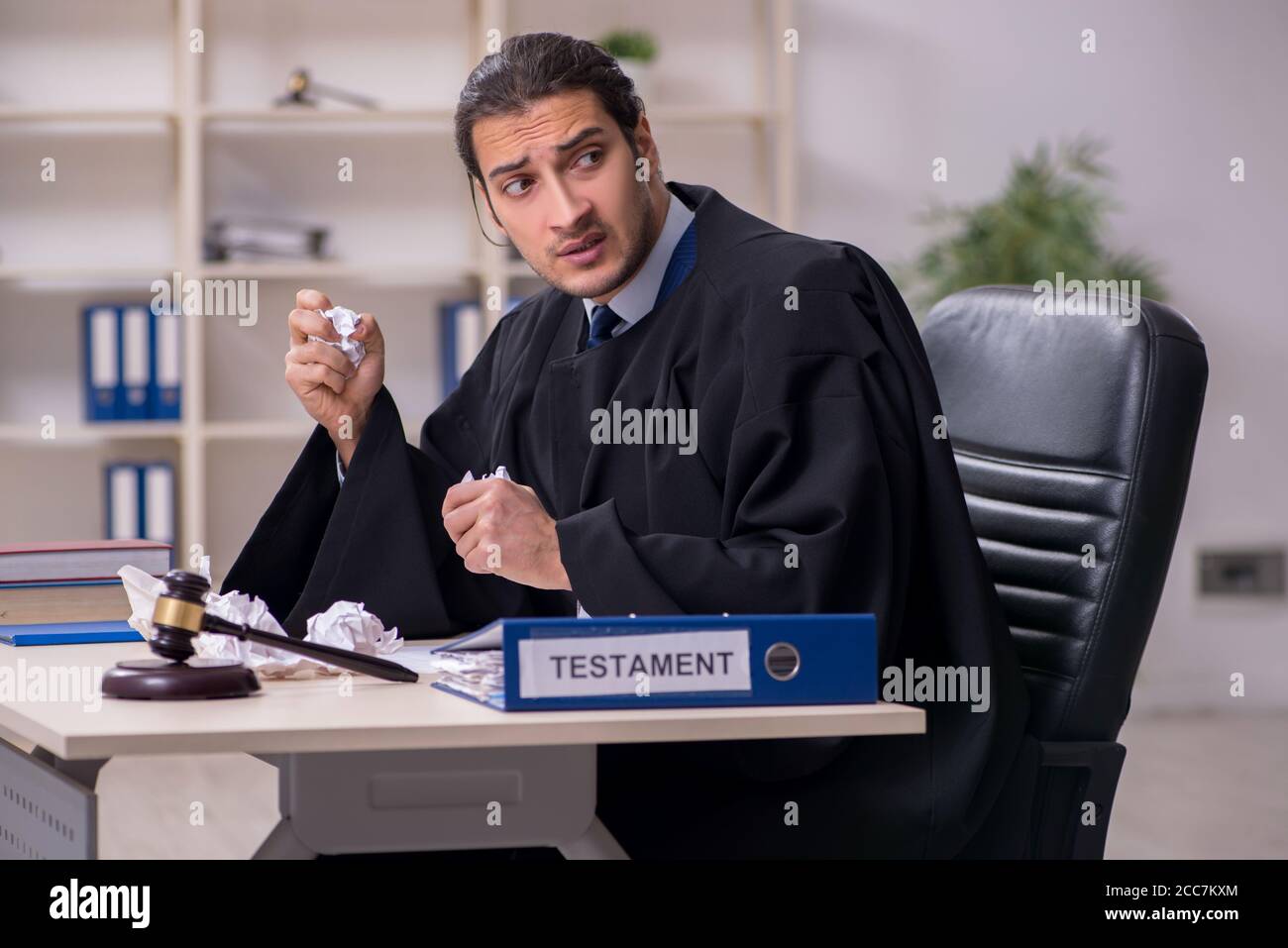 Young judge working in courthouse Stock Photo - Alamy