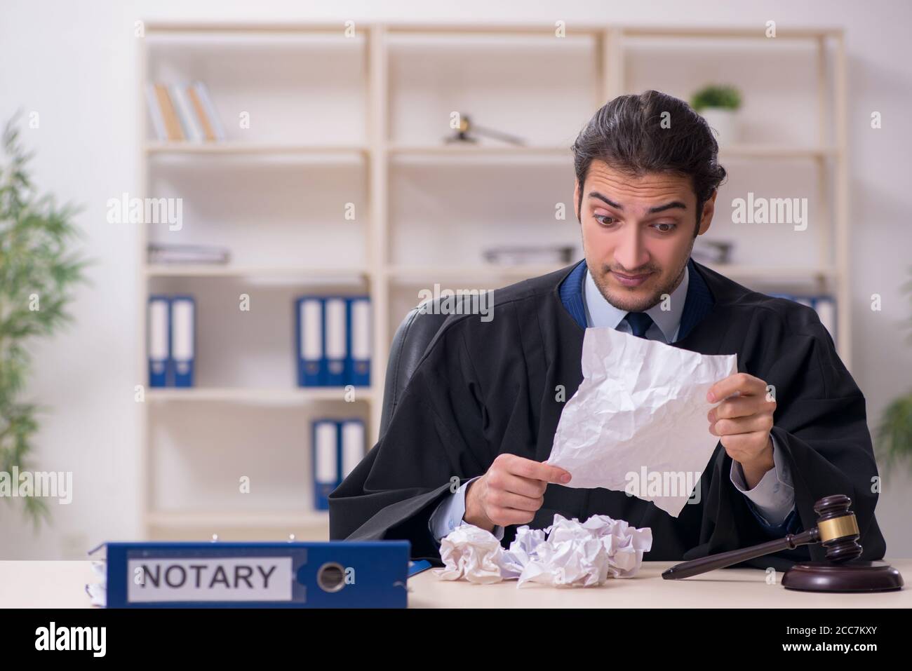Young judge working in courthouse Stock Photo - Alamy