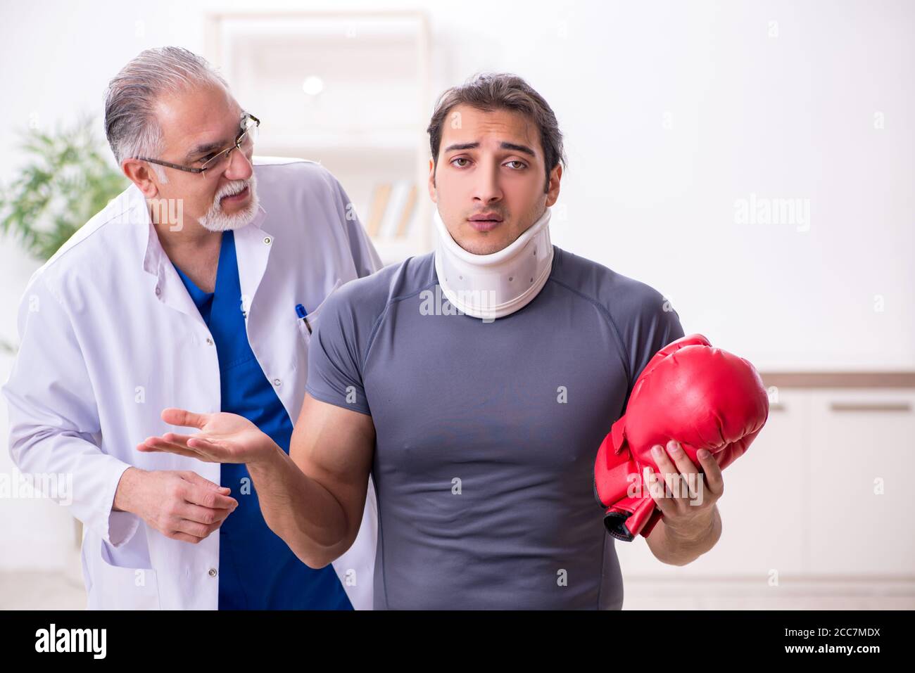 Young injured boxer visiting doctor traumatologist Stock Photo - Alamy