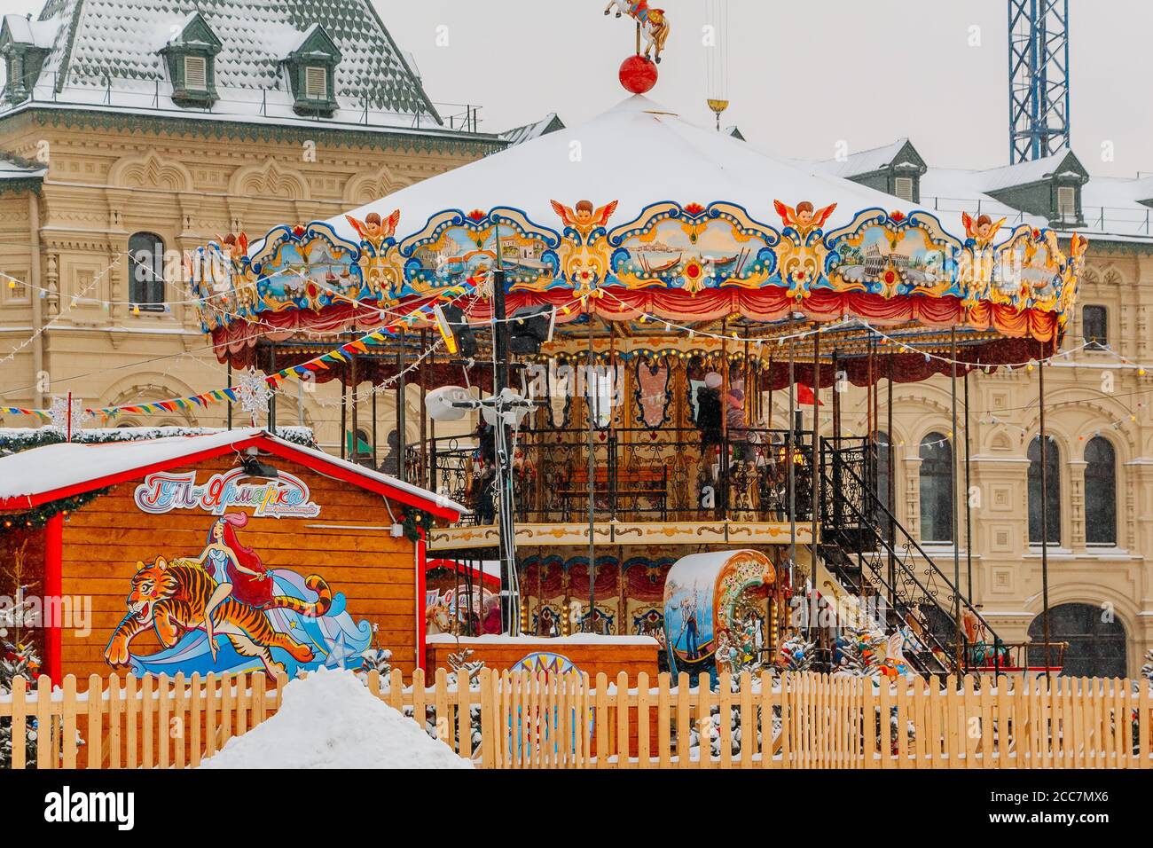 New Year's fair on Red Square, decorated Christmas tree on a background ...