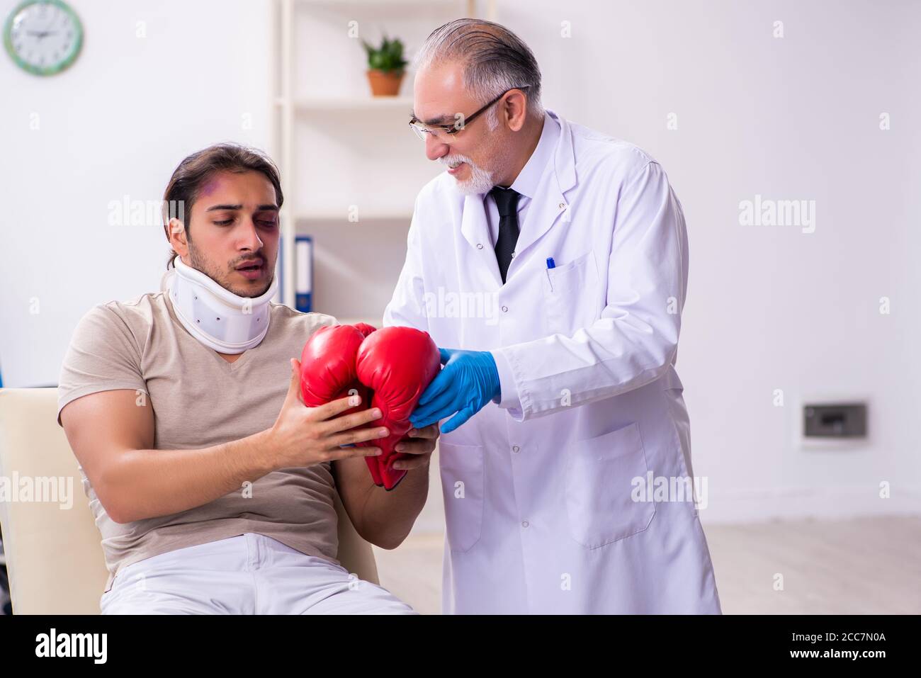 Young face injured man visiting experienced male doctor traumatologist ...