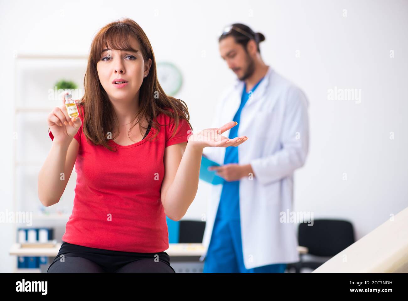 Female diabetic patient visiting young doctor Stock Photo - Alamy