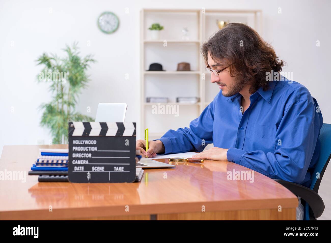 Professional film director script working hi-res stock photography and ...