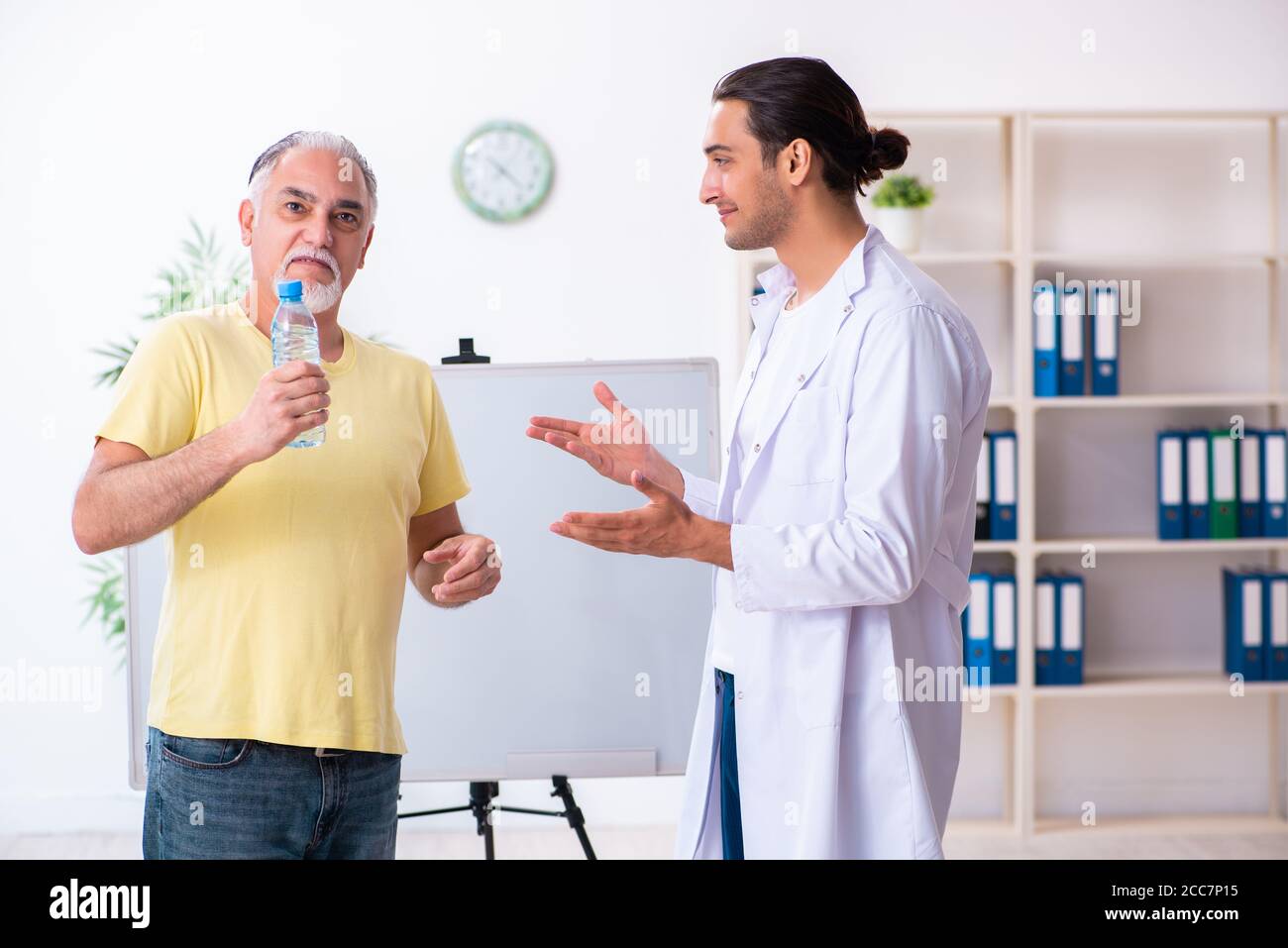 The doctor dietician giving advices to fat overweight patient Stock ...