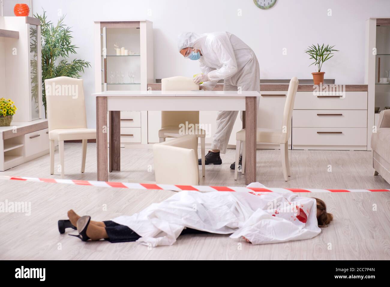 Forensic experts at the crime scene at home Stock Photo - Alamy