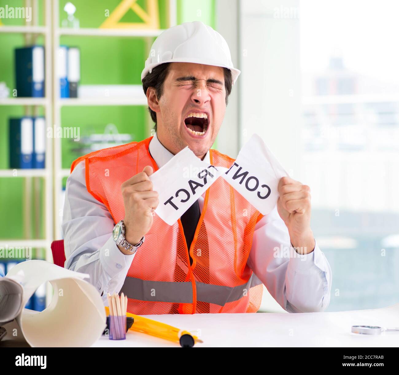 The angry construction supervisor cancelling contract Stock Photo - Alamy