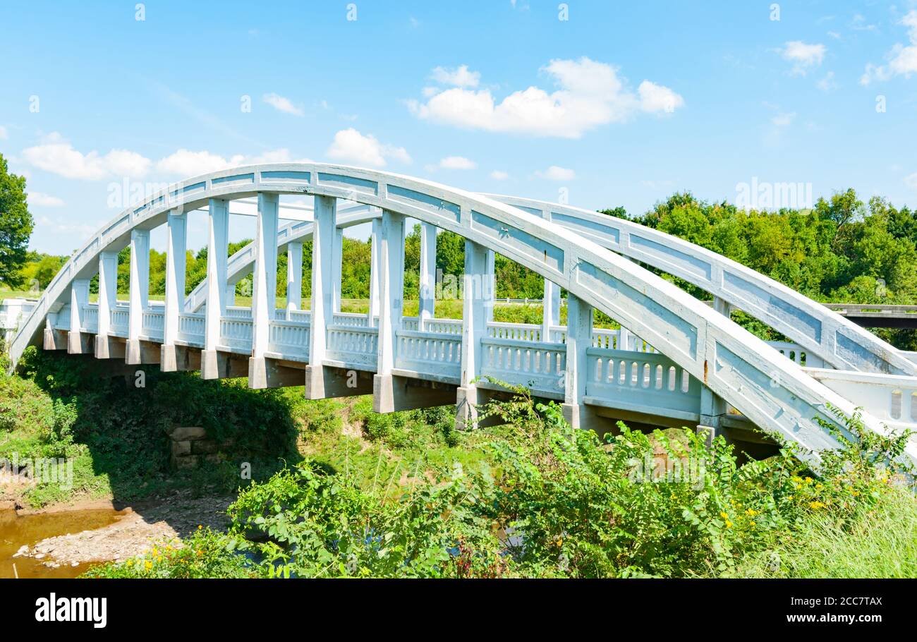 White concrete arch Bush Creek Bridge, Kansas, also known as Rainbow ...