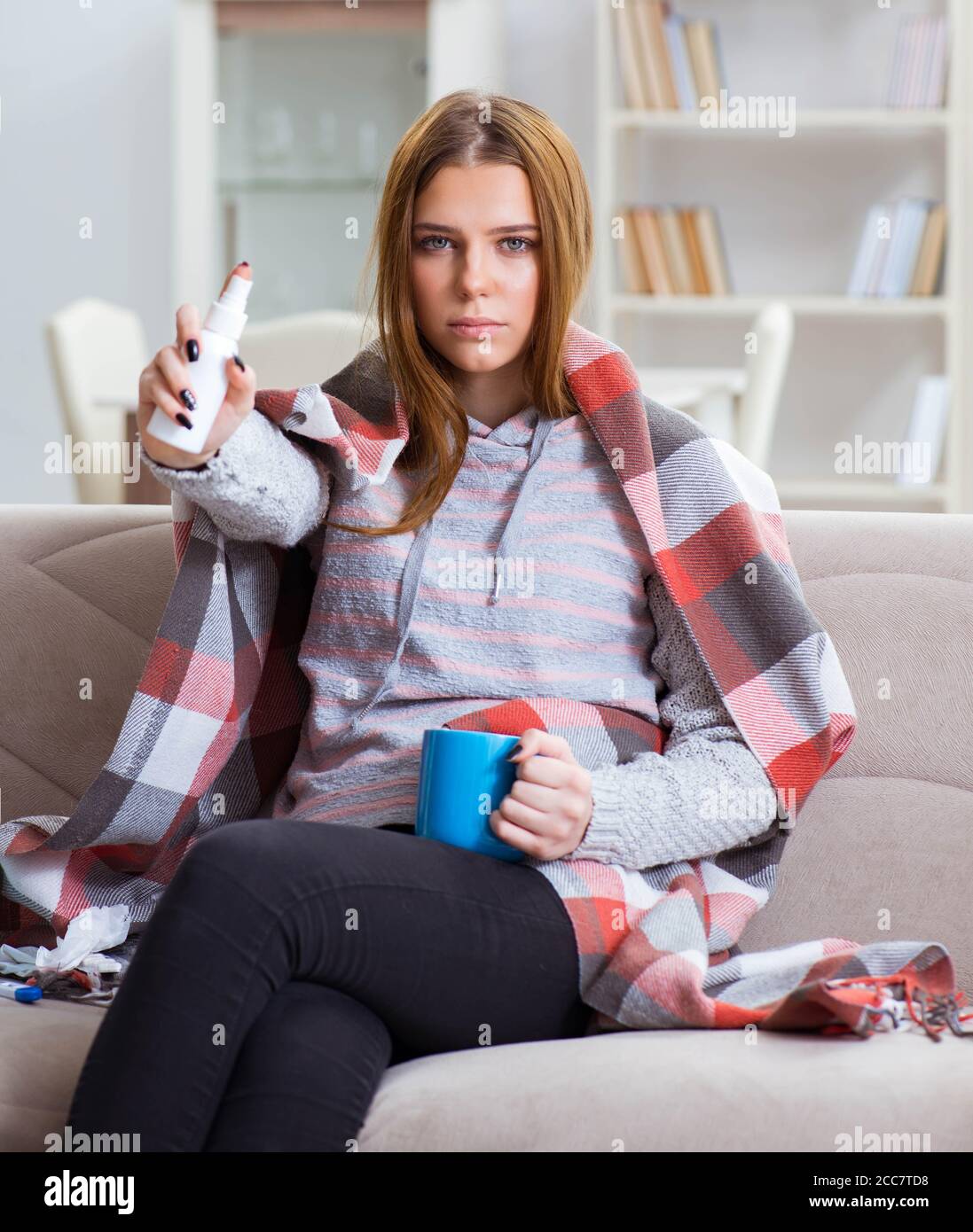 The sick woman suffering from flu at home Stock Photo - Alamy