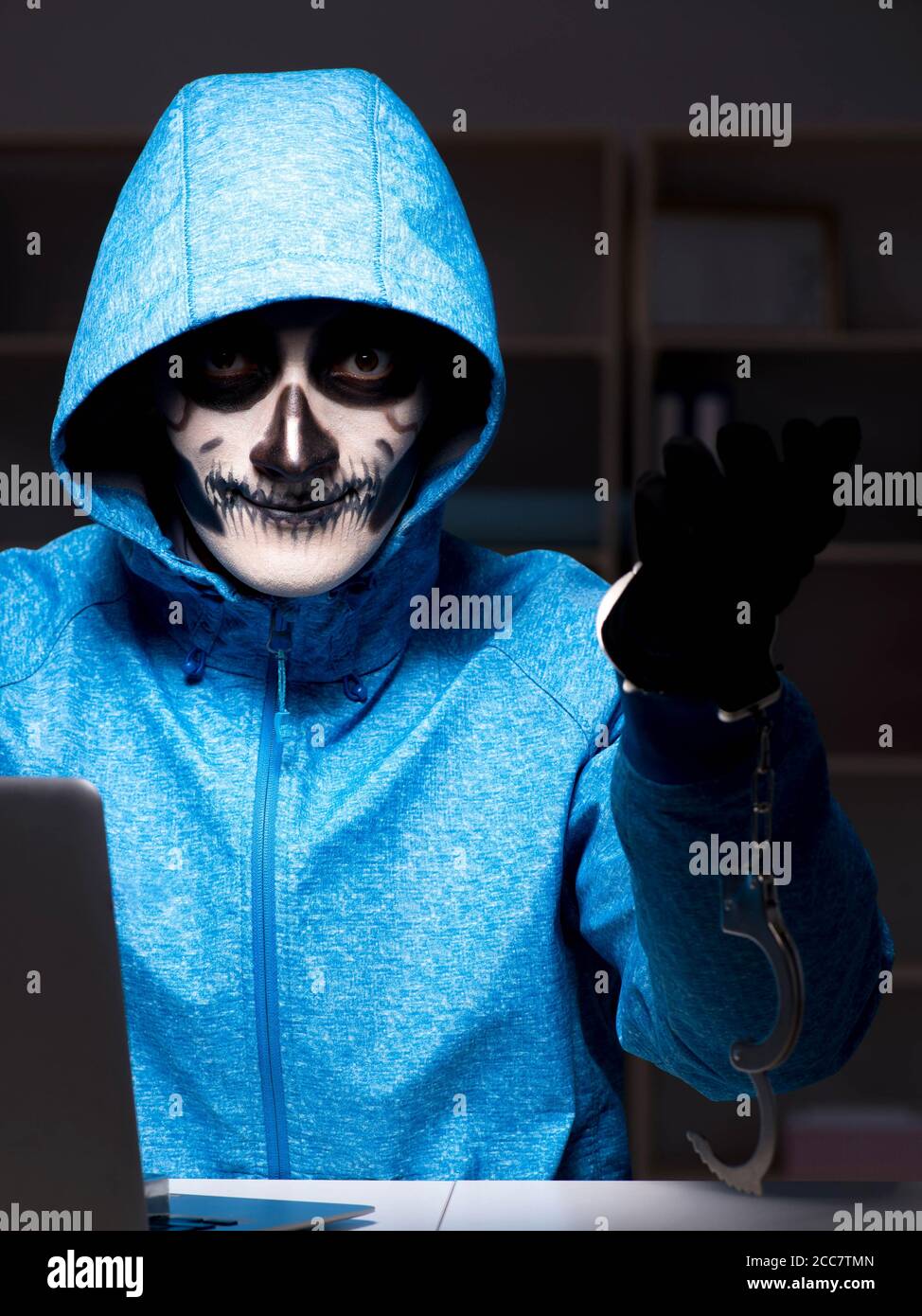 The scary hacker hacking security firewall late in office Stock Photo ...