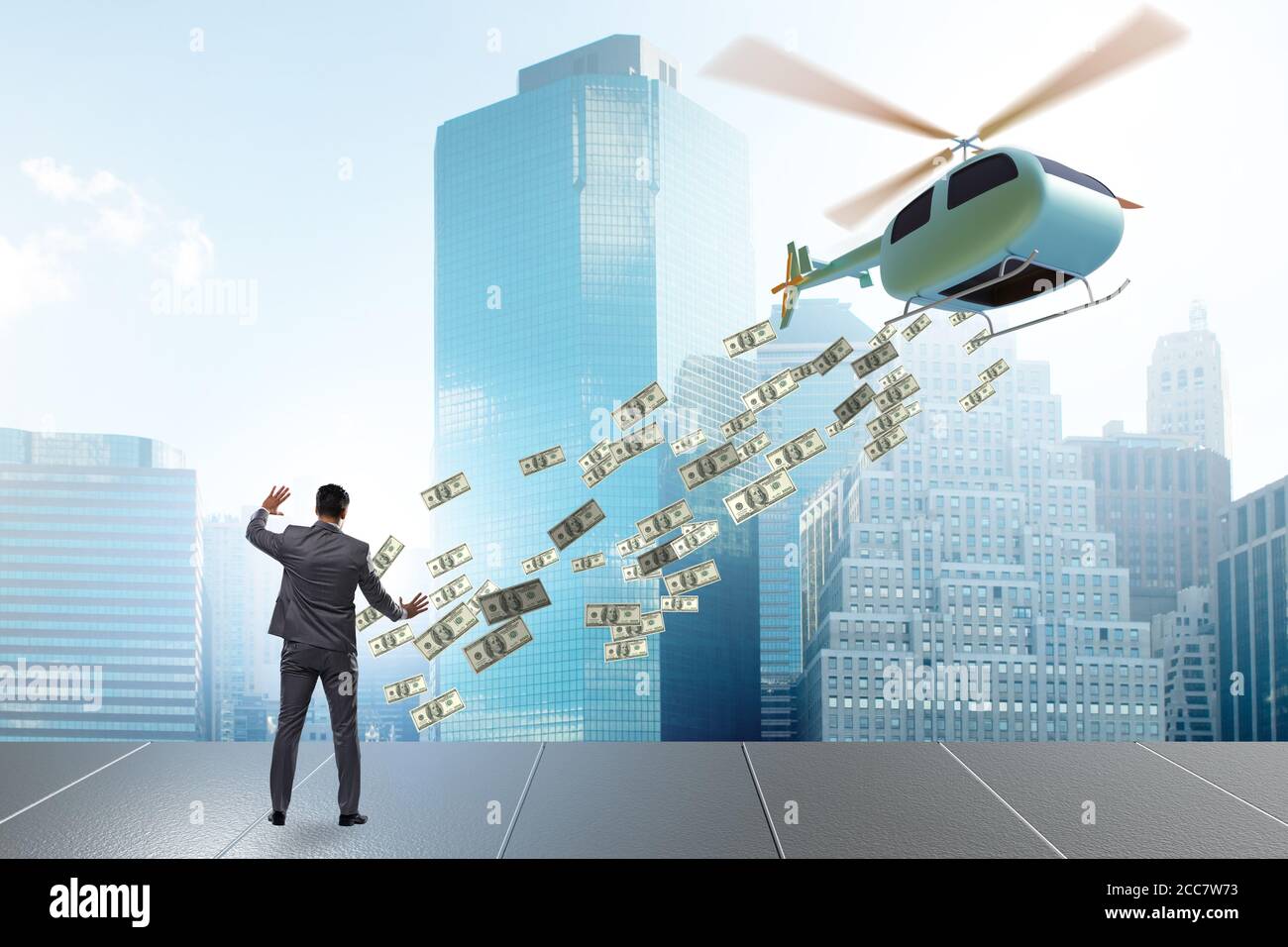 Helicopter money concept with the businessman Stock Photo - Alamy