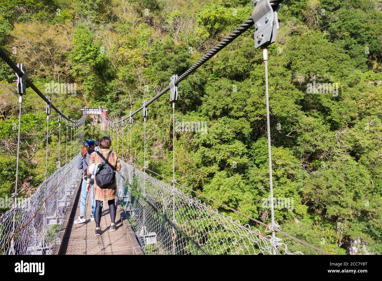 Hualien, Taiwan - Hikers at Zhuilu Old Road in Taroko National Park ...