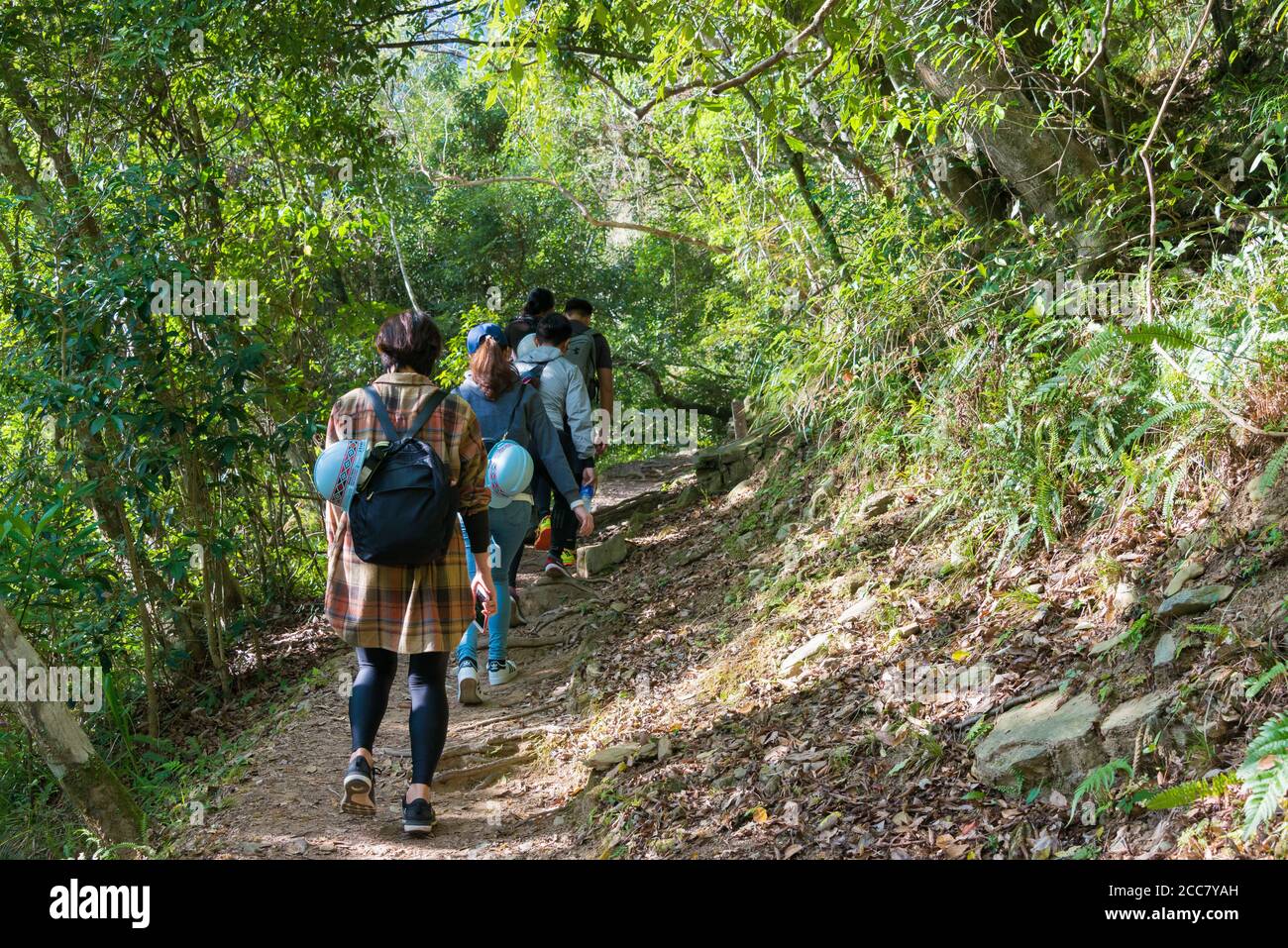 Hualien, Taiwan - Hikers at Zhuilu Old Road in Taroko National Park ...