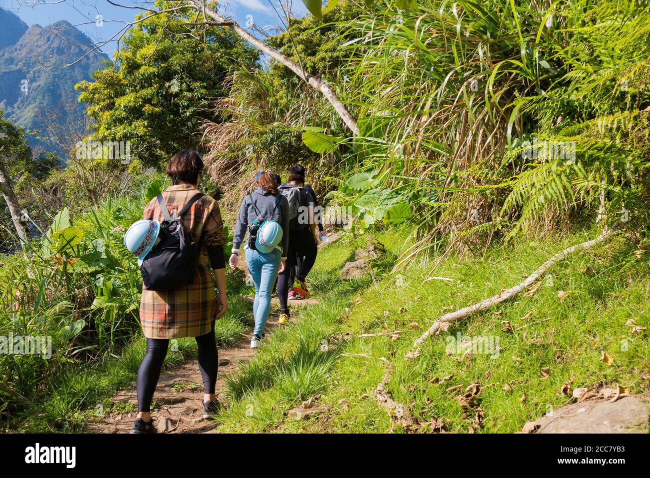 Hualien, Taiwan - Hikers at Zhuilu Old Road in Taroko National Park ...