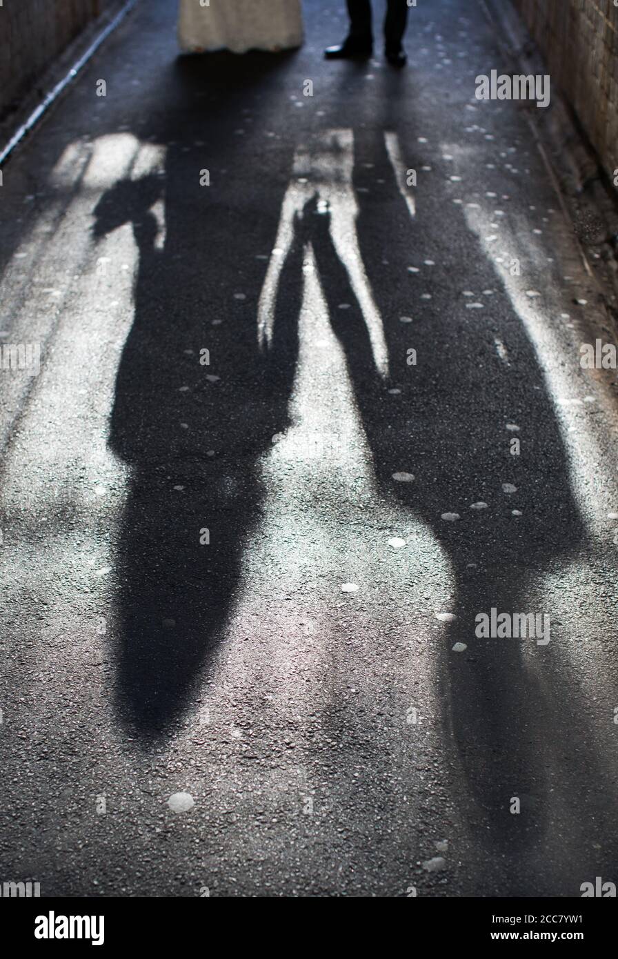 Shadows of a married couple on their wedding day Stock Photo - Alamy