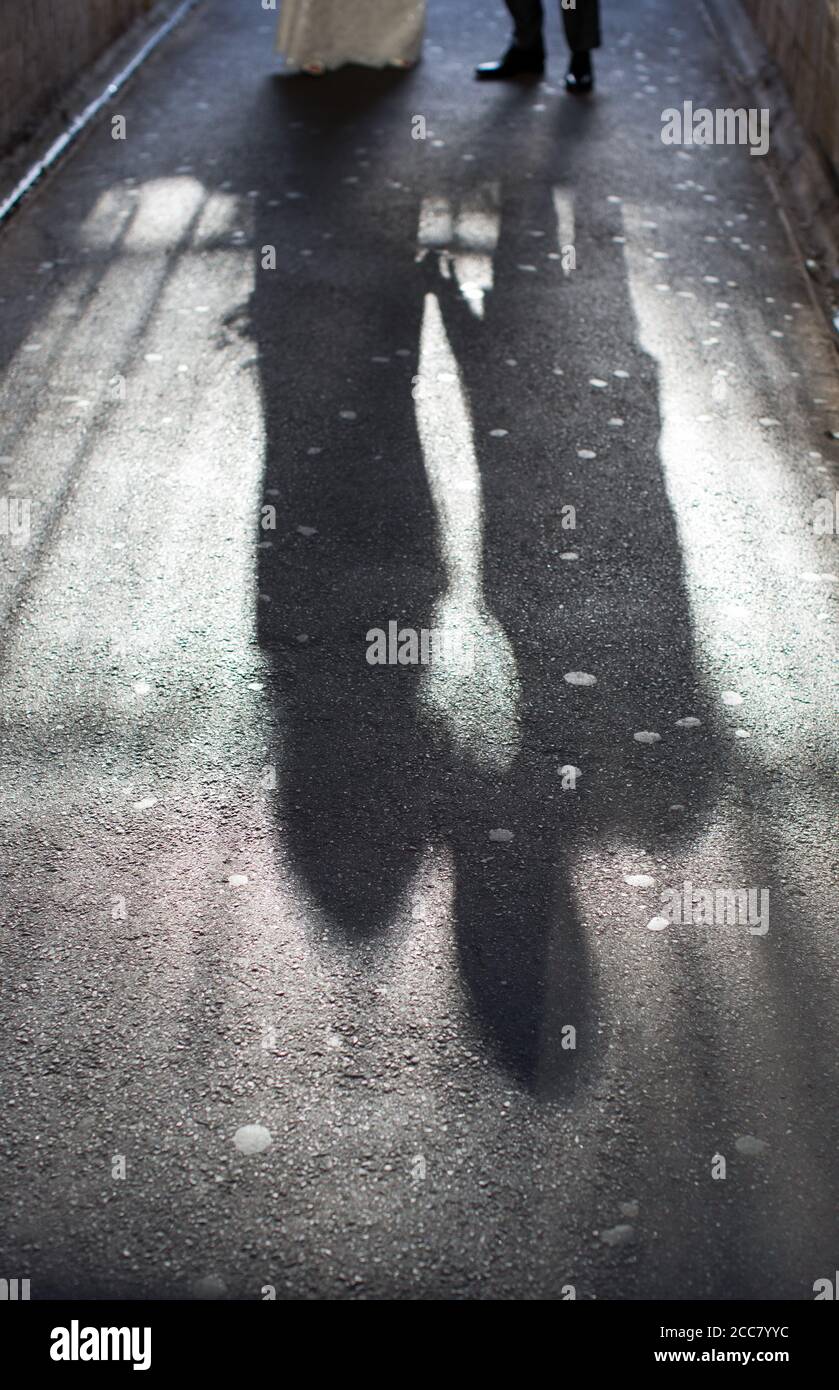 Shadows of a married couple on their wedding day Stock Photo - Alamy
