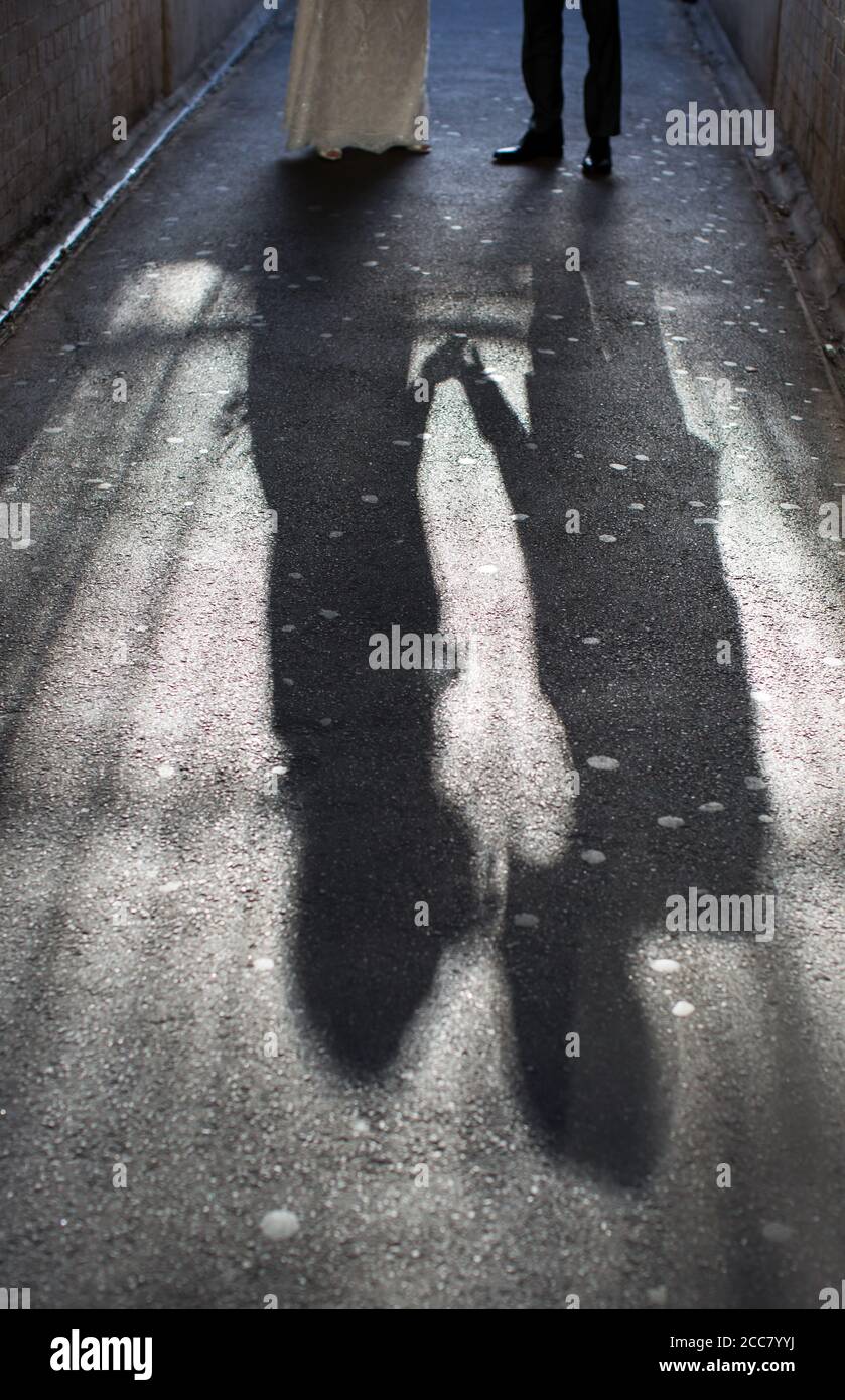 Shadows of a married couple on their wedding day Stock Photo - Alamy