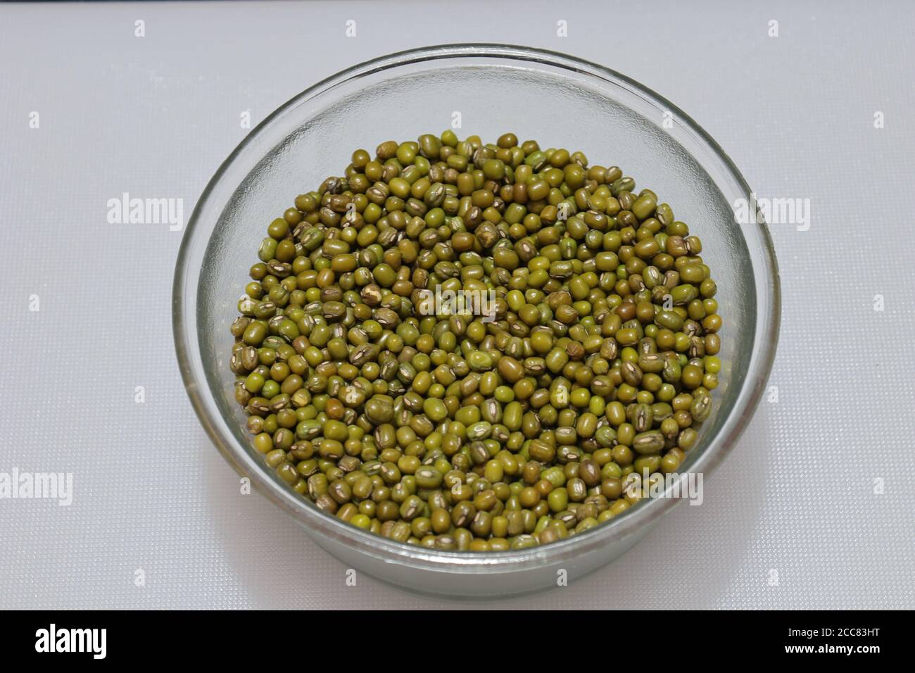 Fresh germinated green gram beans in white background Stock Photo - Alamy