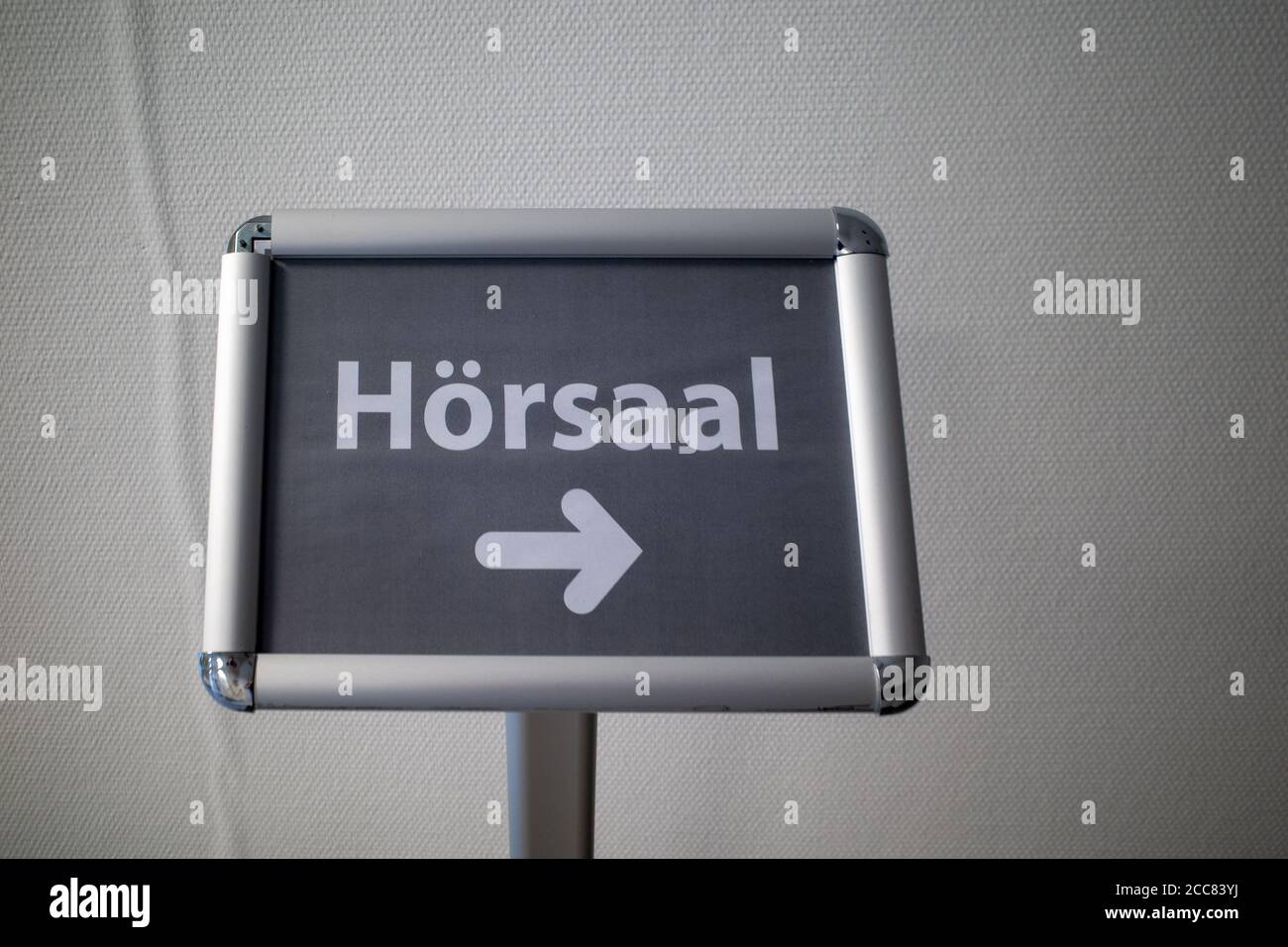 on a grey sign with white letters Lecture hall Stock Photo - Alamy