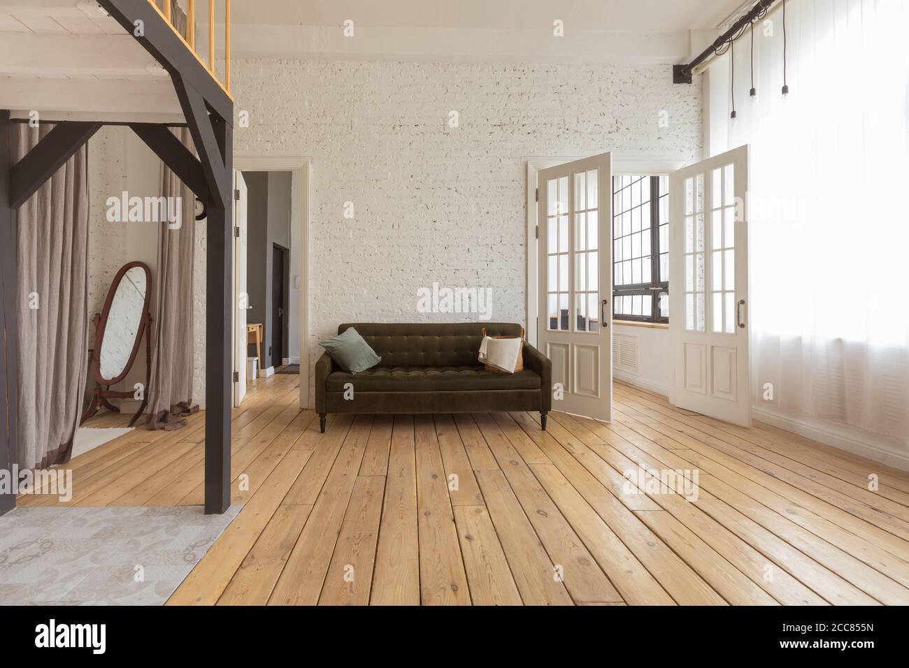 Interior of spacious room in apartment Stock Photo - Alamy