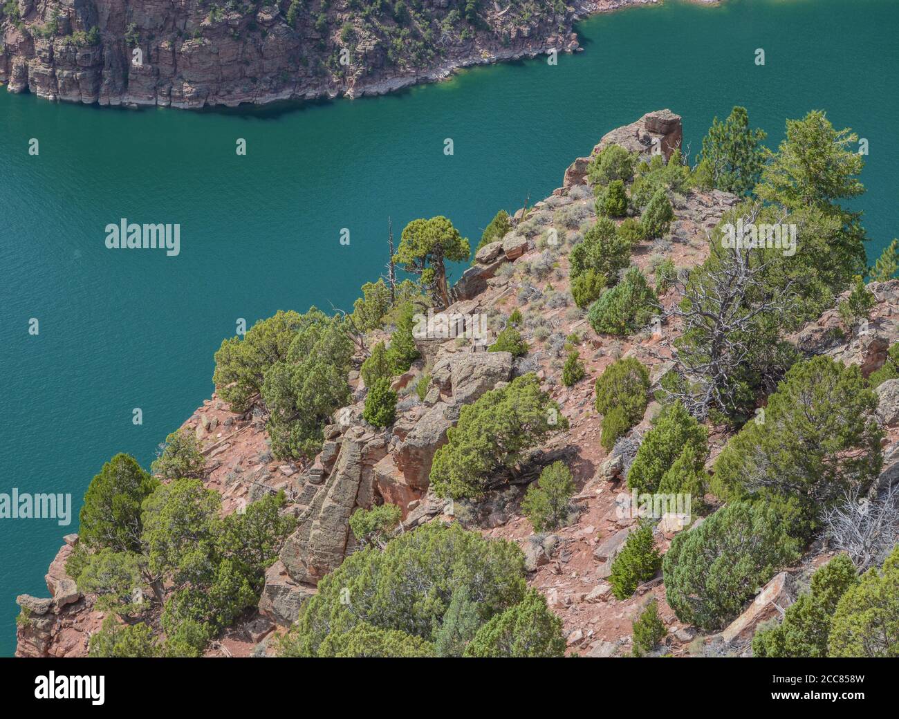 The gorgeous red rook walled Green River flowing through the Flaming ...
