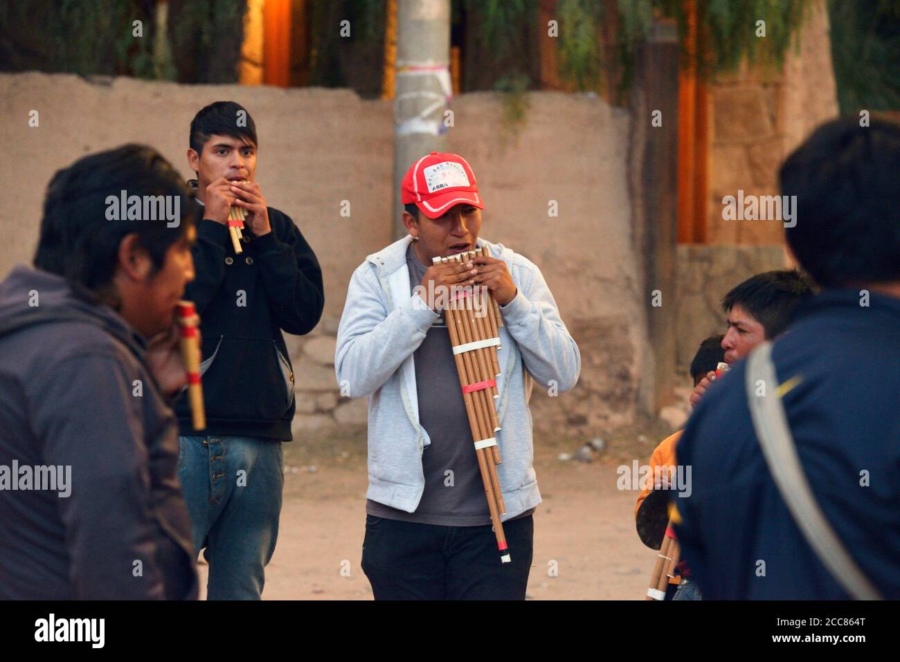 Local residents performing traditional Andean music in San Francisco de ...