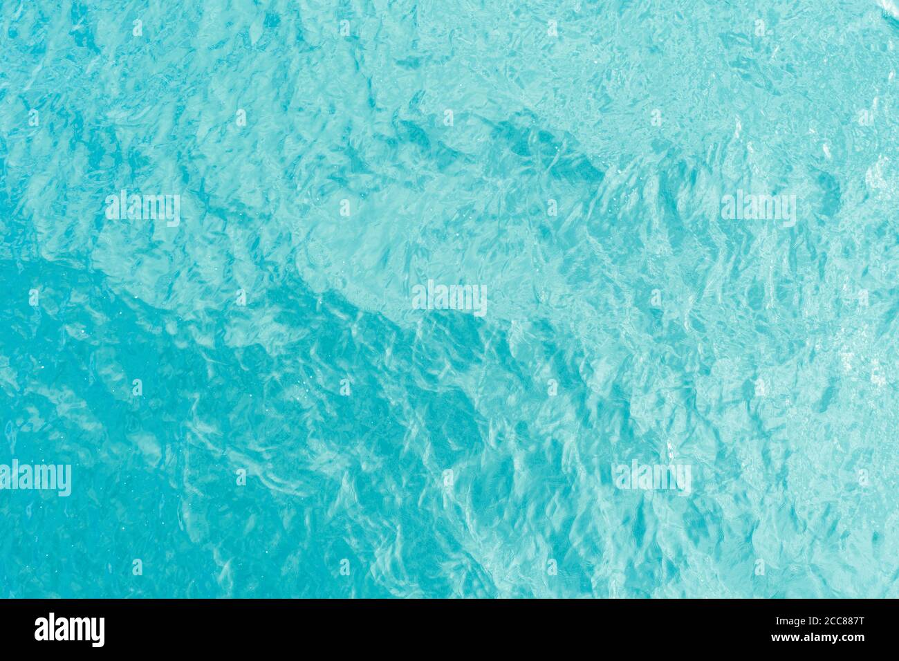 Aerial view of a crystal clear sea turquoise water texture. View from ...