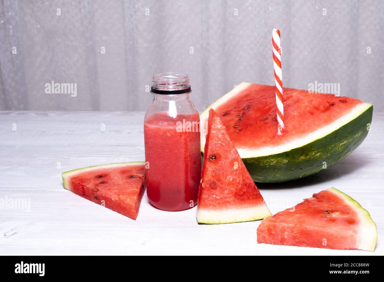 the most beautiful watermelon smoothie and slices of fresh red ...