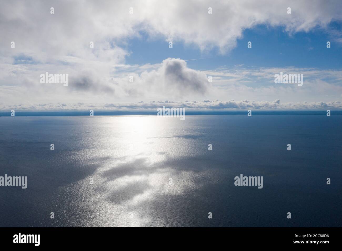 Aerial view clouds over the sea. View seashore and coastline from drone ...