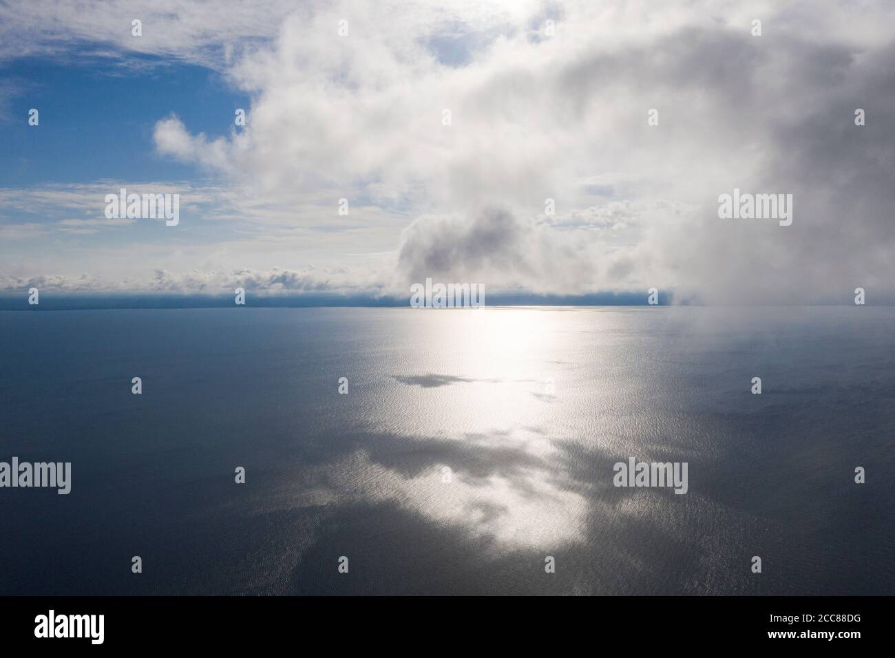 Aerial view clouds over the sea. View seashore and coastline from drone ...