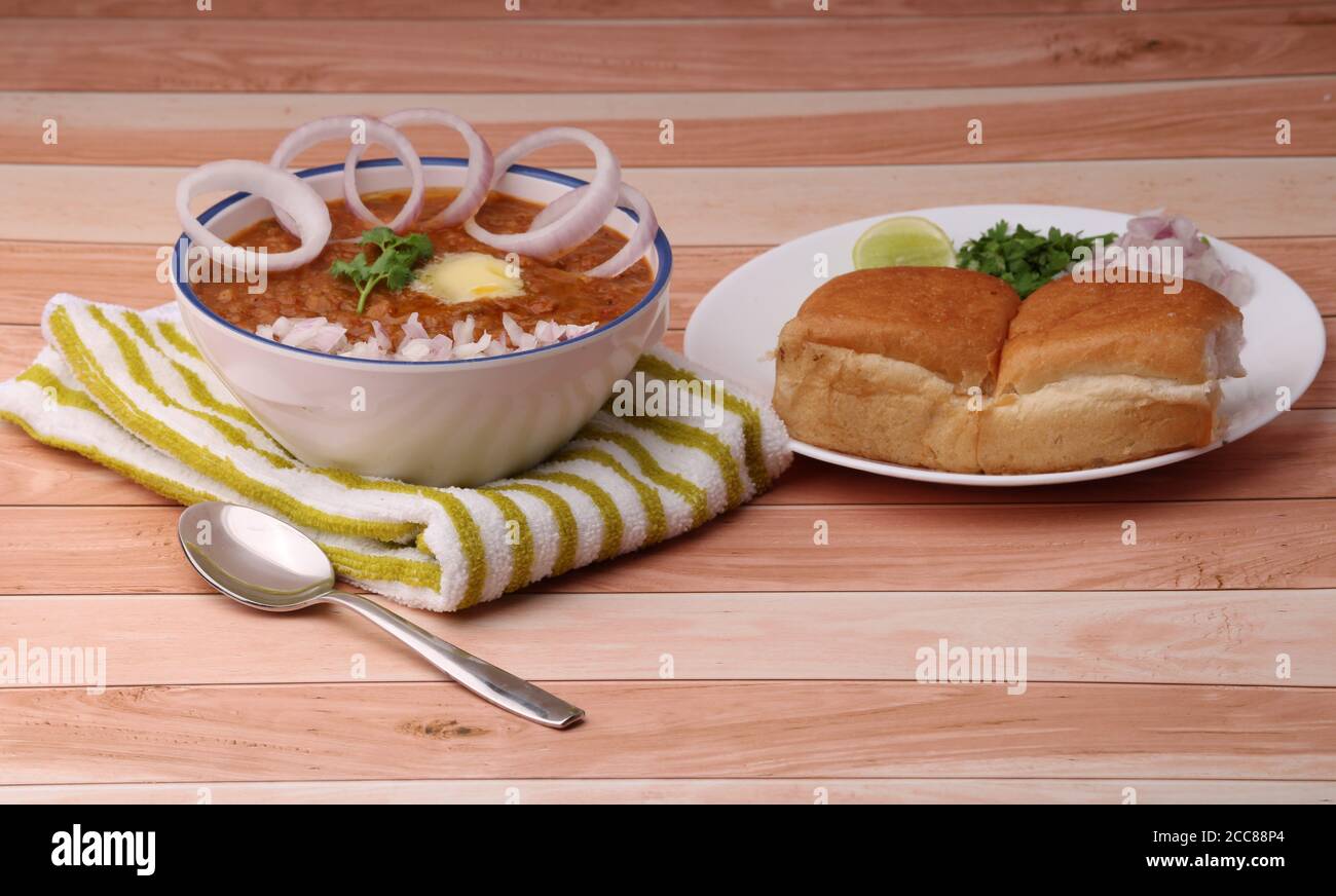 Pav Bhaji is a fast food dish from India, Thick and spicy vegetable ...