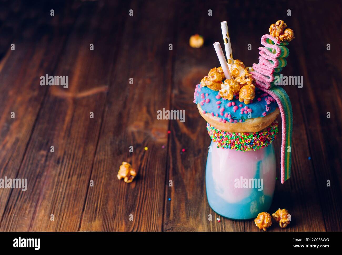 Color freak shake on rustic wooden background with blank space for text ...