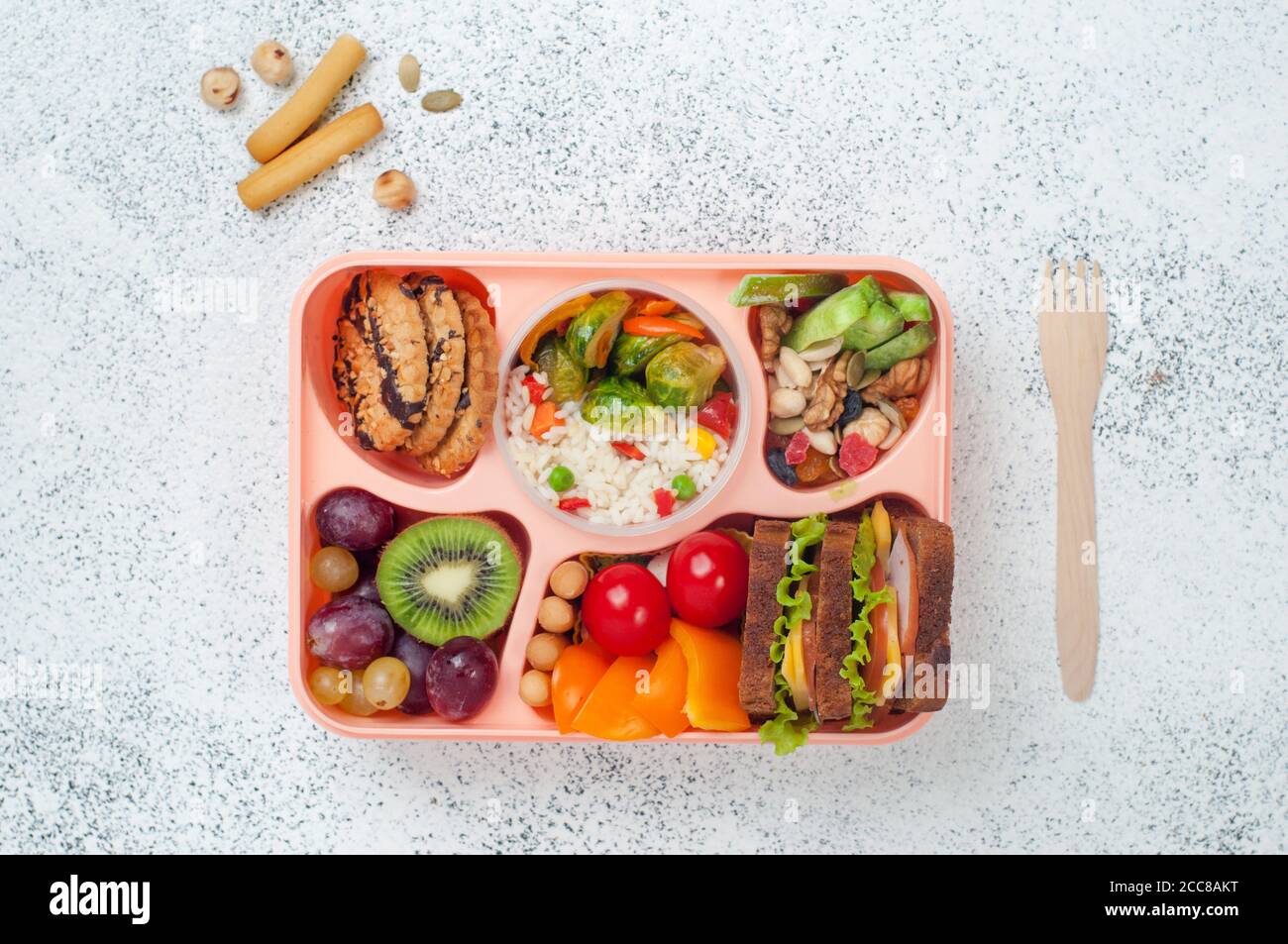 Open lunch box with healthy lunch on the grey background Stock Photo ...