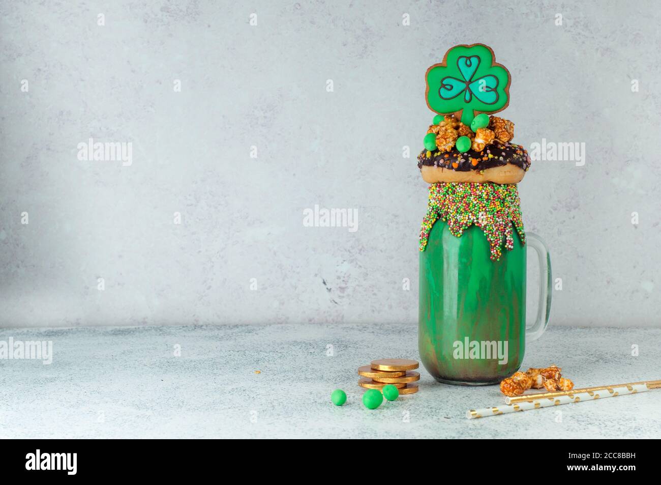 St. Patrick's Day green freak shake topping with clover cookie with ...
