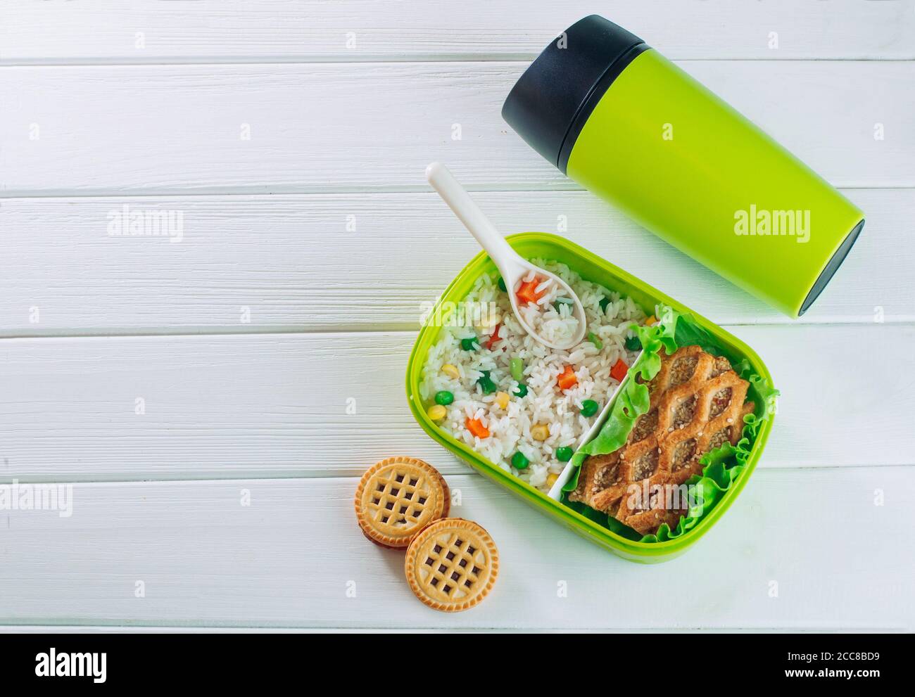 Top view of lunch box on light wooden background Stock Photo - Alamy