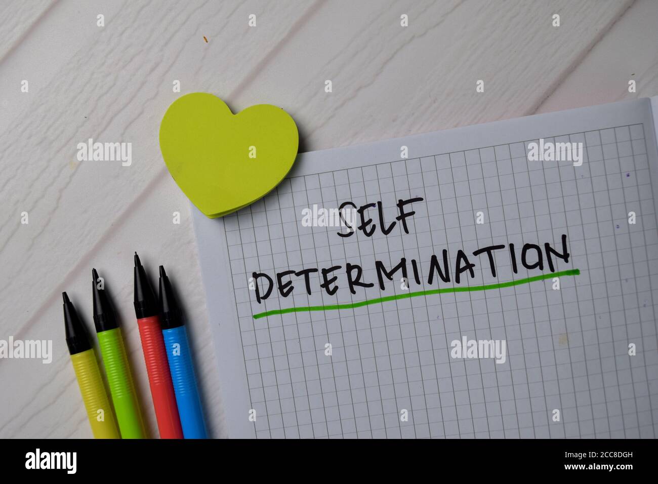 Self Determination write on a book isolated on office desk Stock Photo ...