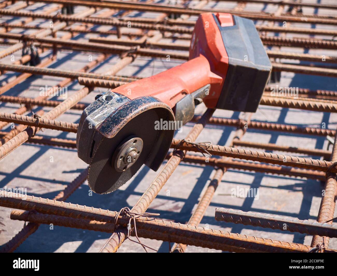 Angle grinder and reinforcement framework of concrete slab Stock Photo ...