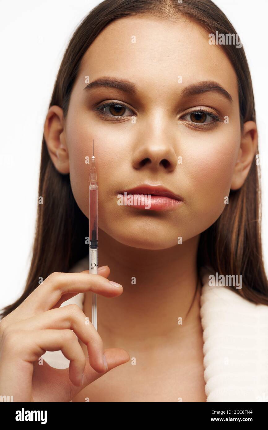 woman in white coat botox injections collagen rejuvenation Stock Photo ...