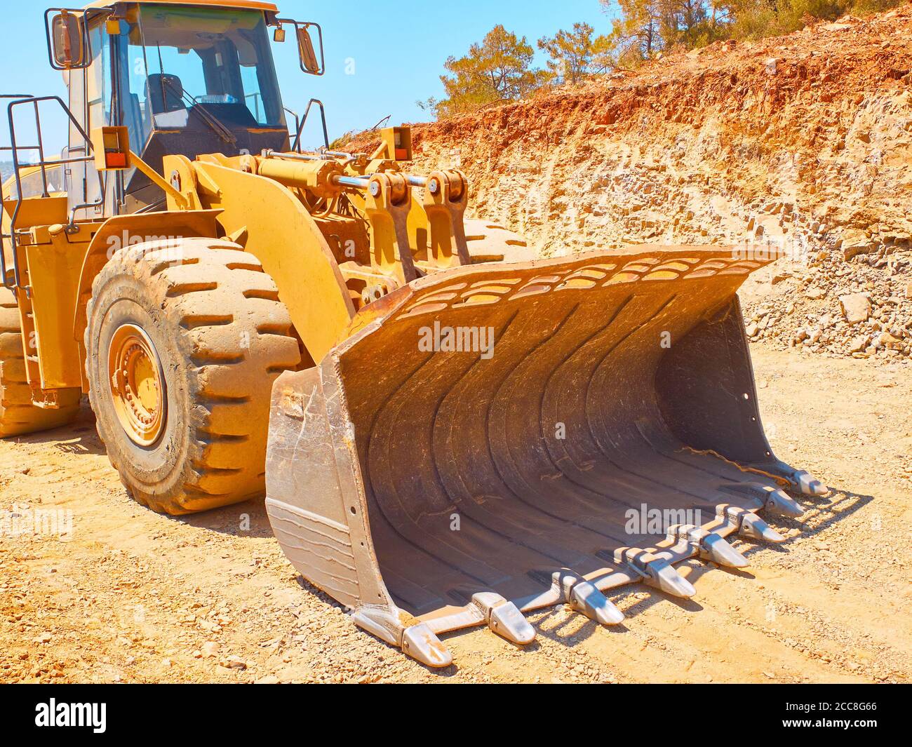 Industrial wheel loader on the road construction works Stock Photo - Alamy