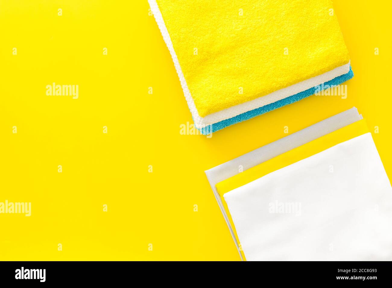 Clean laundry - clothes and towels top view Stock Photo - Alamy