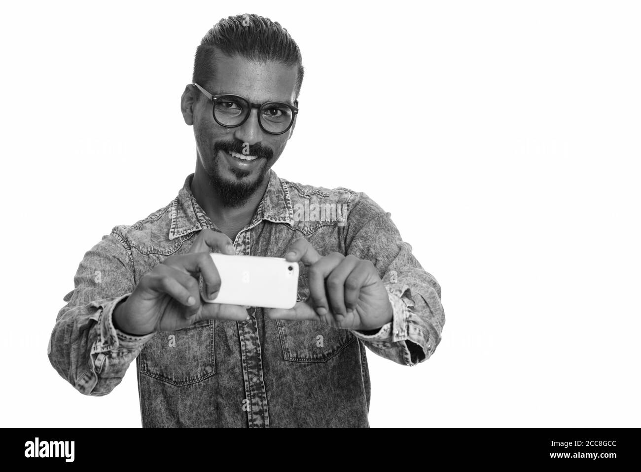 Man glasses mobile Black and White Stock Photos & Images - Alamy