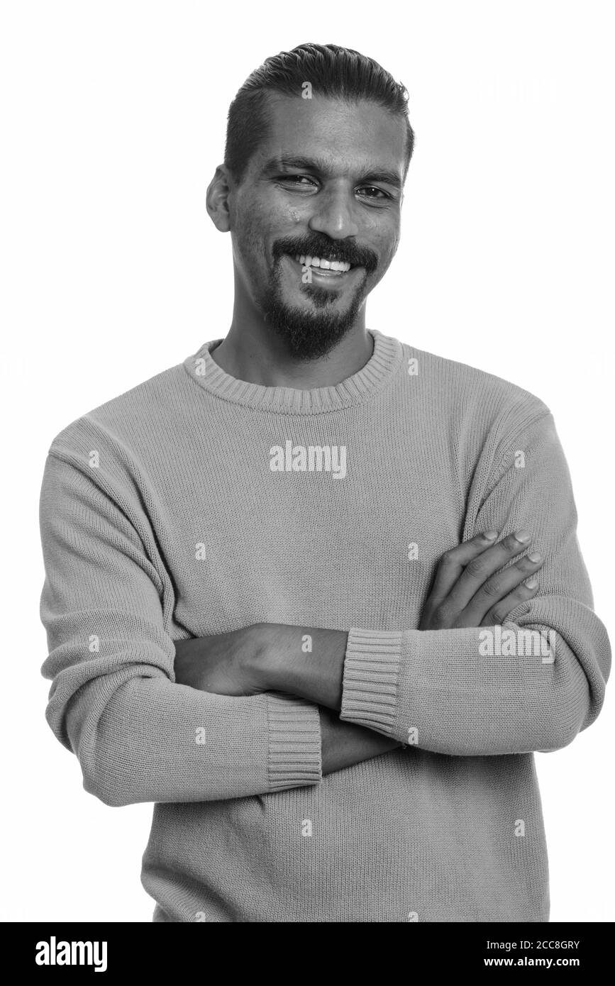 Portrait of happy young handsome bearded Indian man Stock Photo - Alamy
