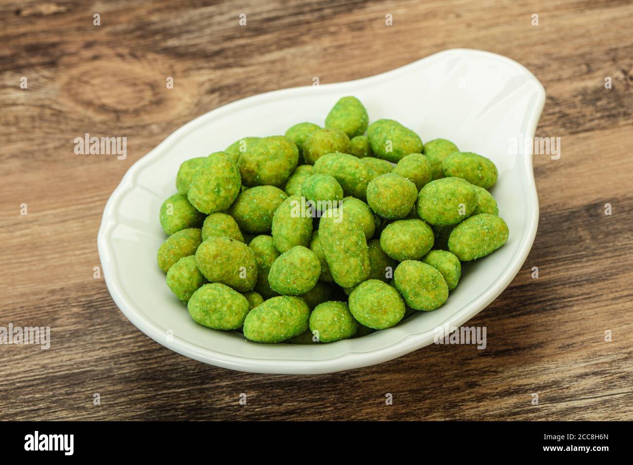Spicy wasabi peanuts snack in the bowl Stock Photo - Alamy
