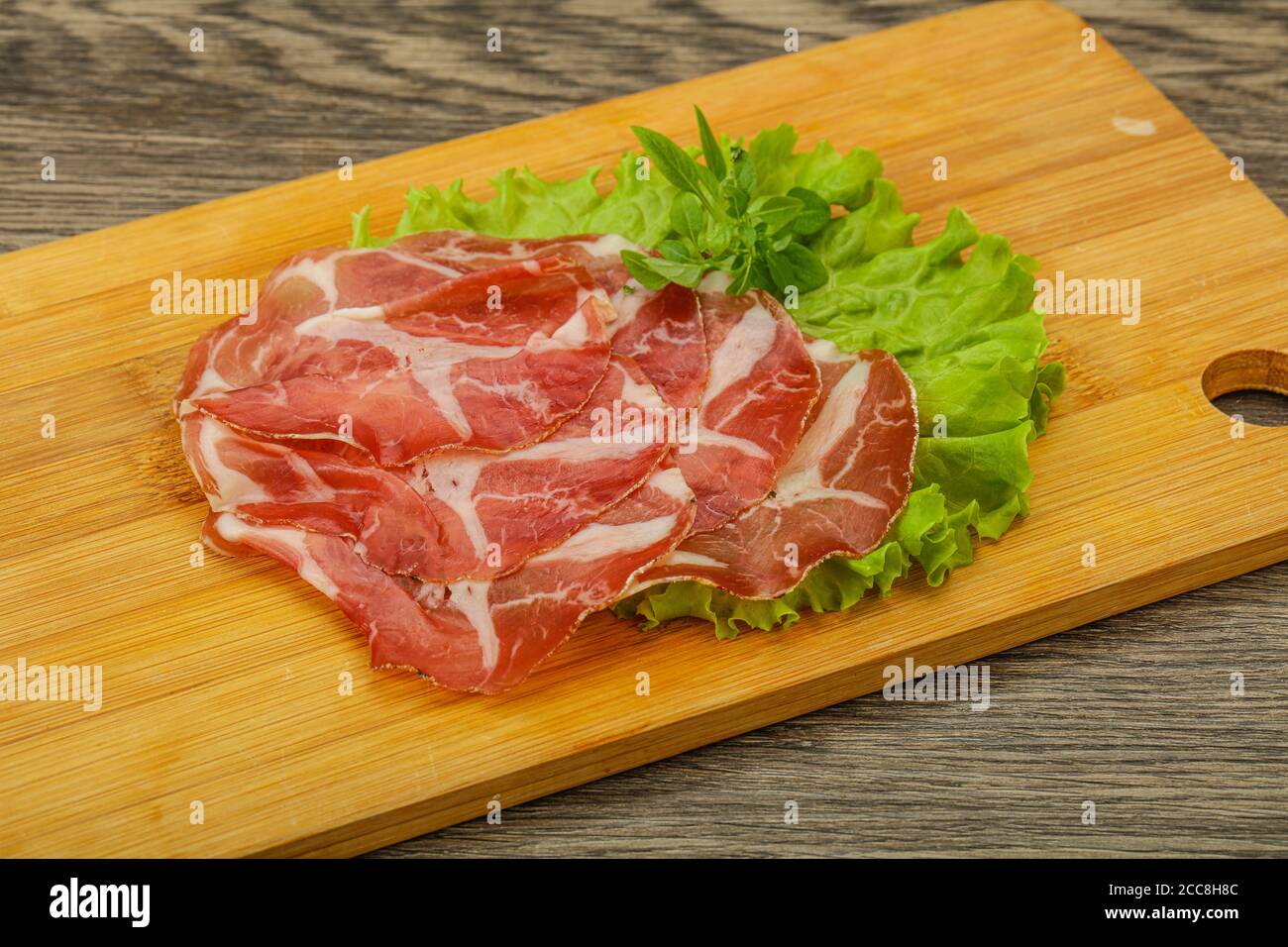 Delicous Smoked pork neck slices snack Stock Photo - Alamy