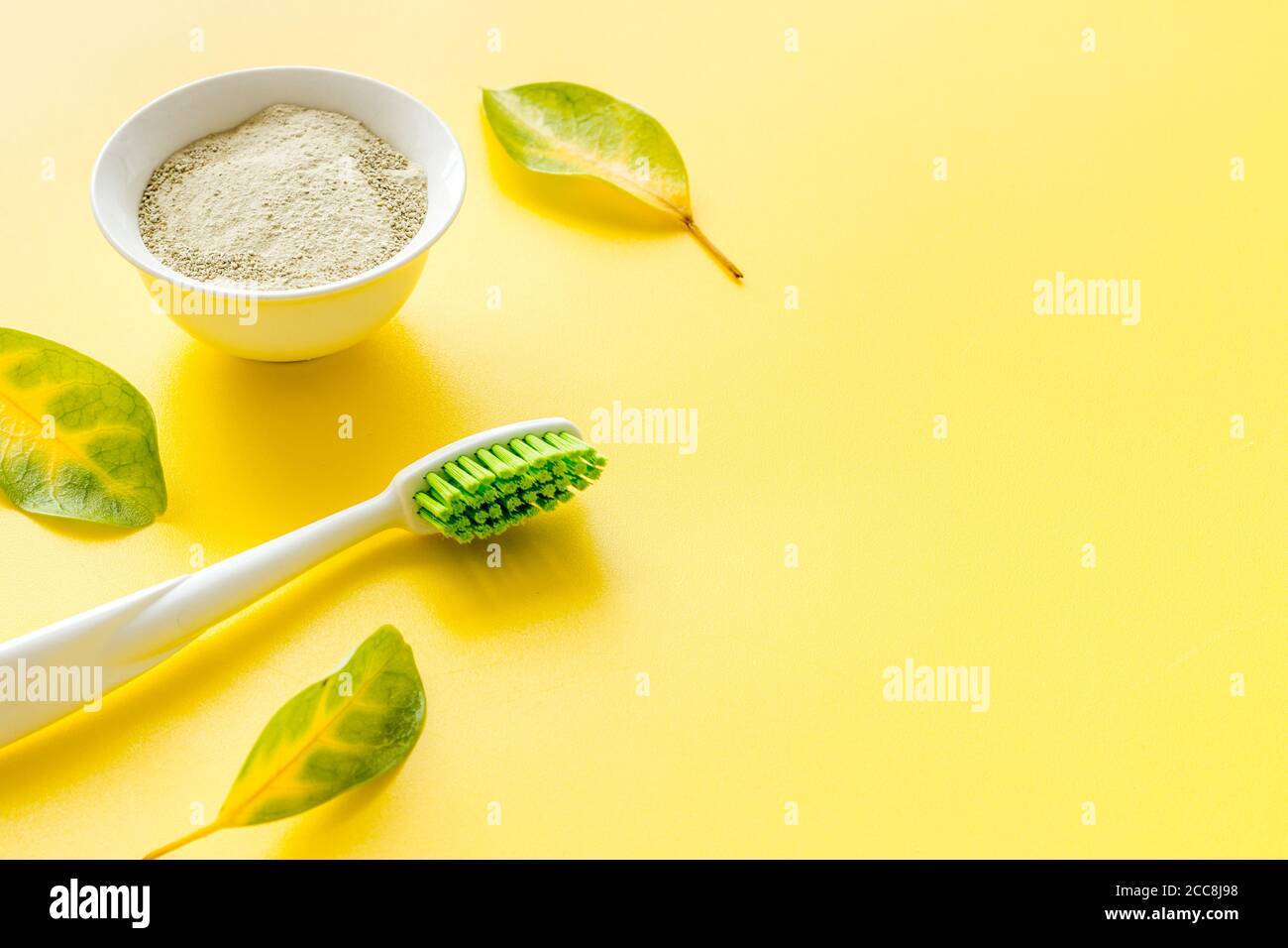 Herbal dental tooth powder with toothbrush. Health care and hygiene ...