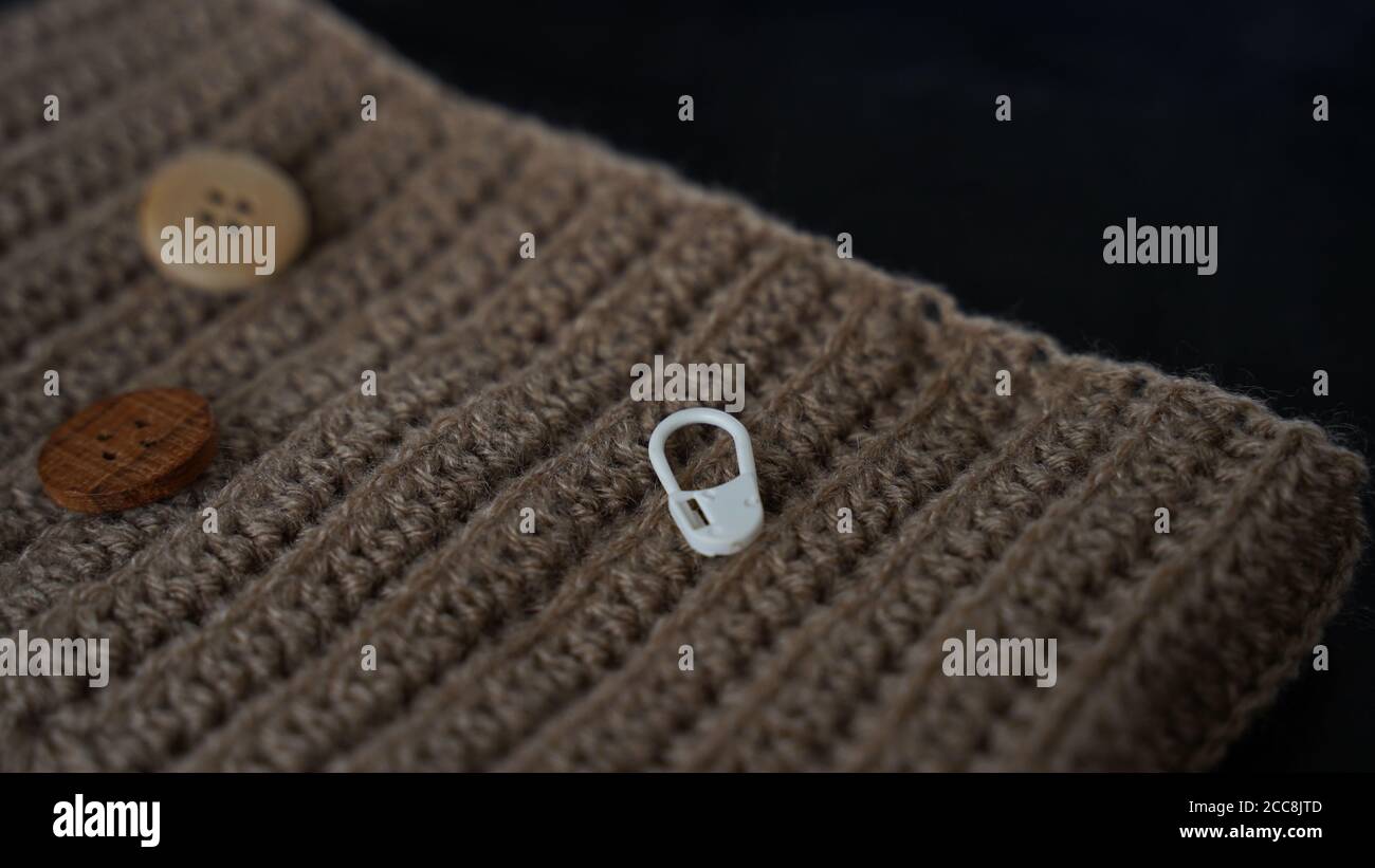 White safety pin and buttons on the fabric Stock Photo - Alamy